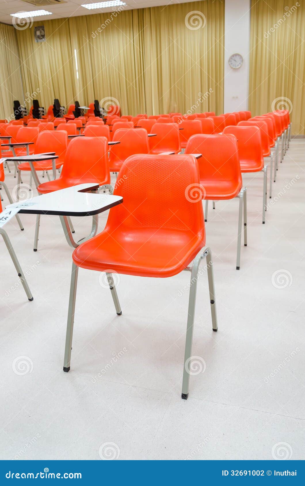 Orange chairs in classroom stock photo. Image of inside - 32691002