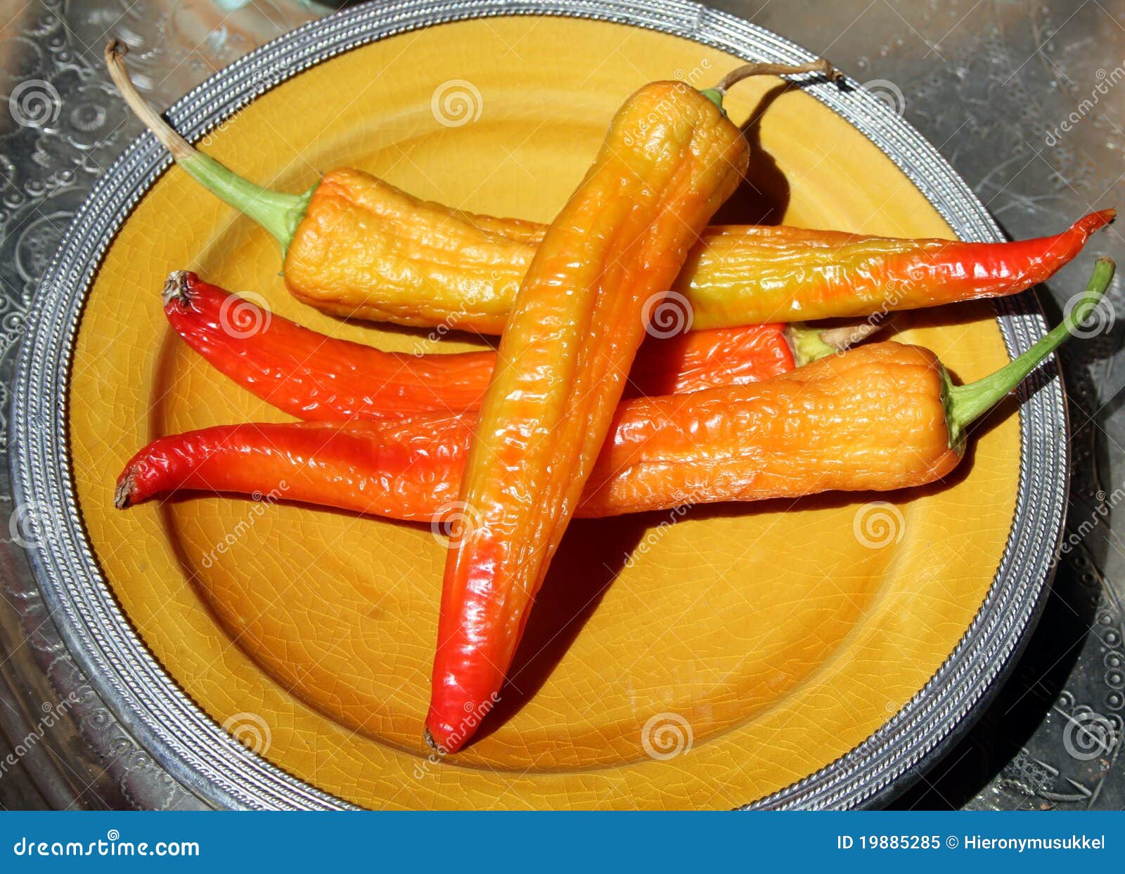 Orange Chili Peppers on a Plate Stock Image - Image of chillies ...