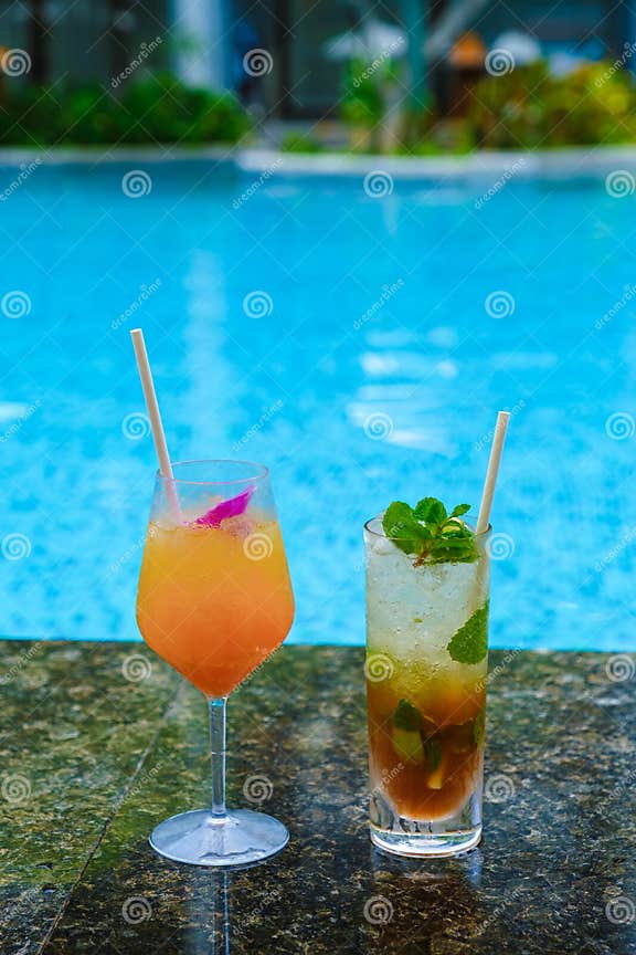 Orange Cocktail And Mojito At A Swimming Pool On A Luxury Vacation Stock Image Image Of Bikini