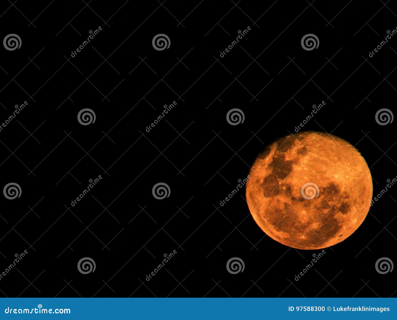 Orange colored Rising Moon stock photo. Image of harvest - 97588300