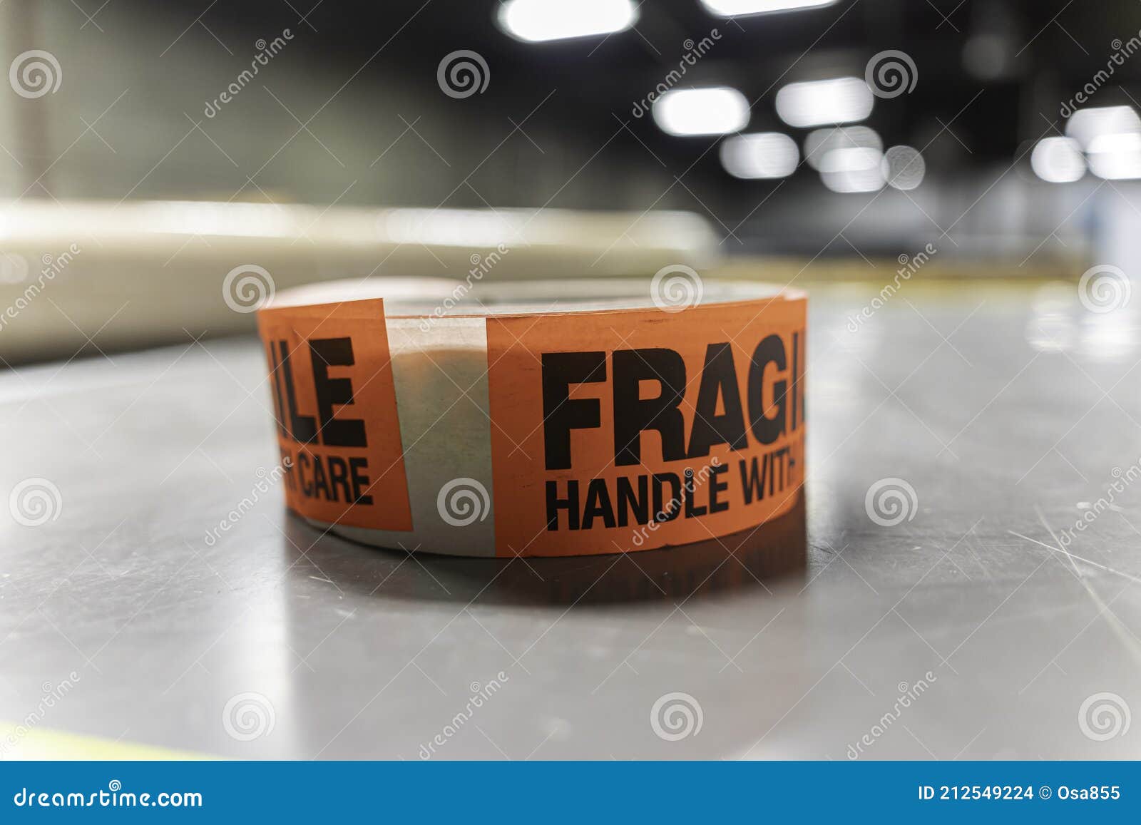 Orange Colored Shipping Label for Delivering Fragile Items Stock Photo ...