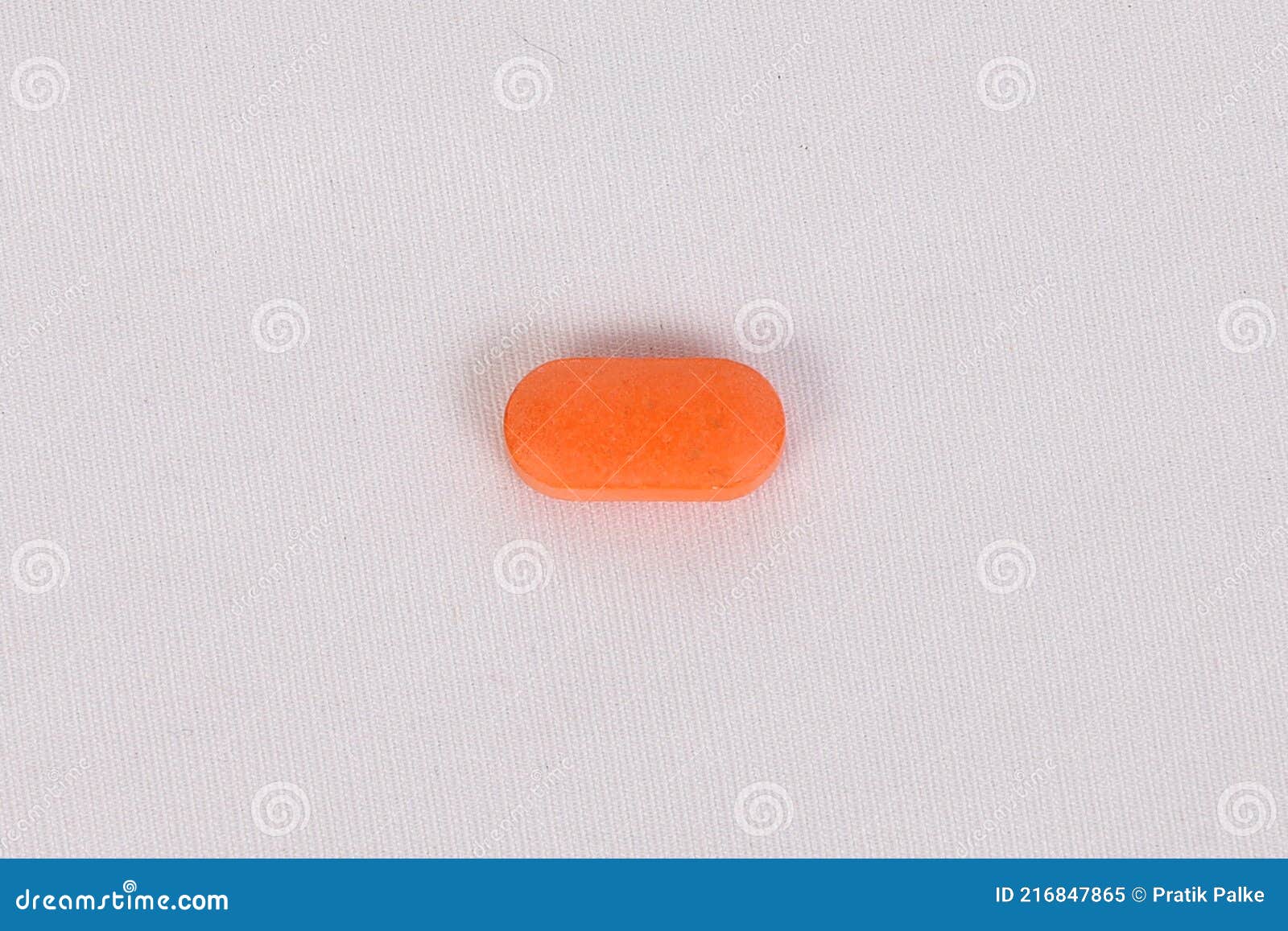 An orange color tablet stock image. Image of color, colour - 216847865