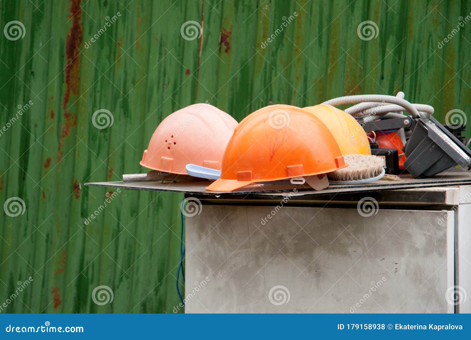 Orange Construction Helmets without Workers. Work Has Stopped Stock ...