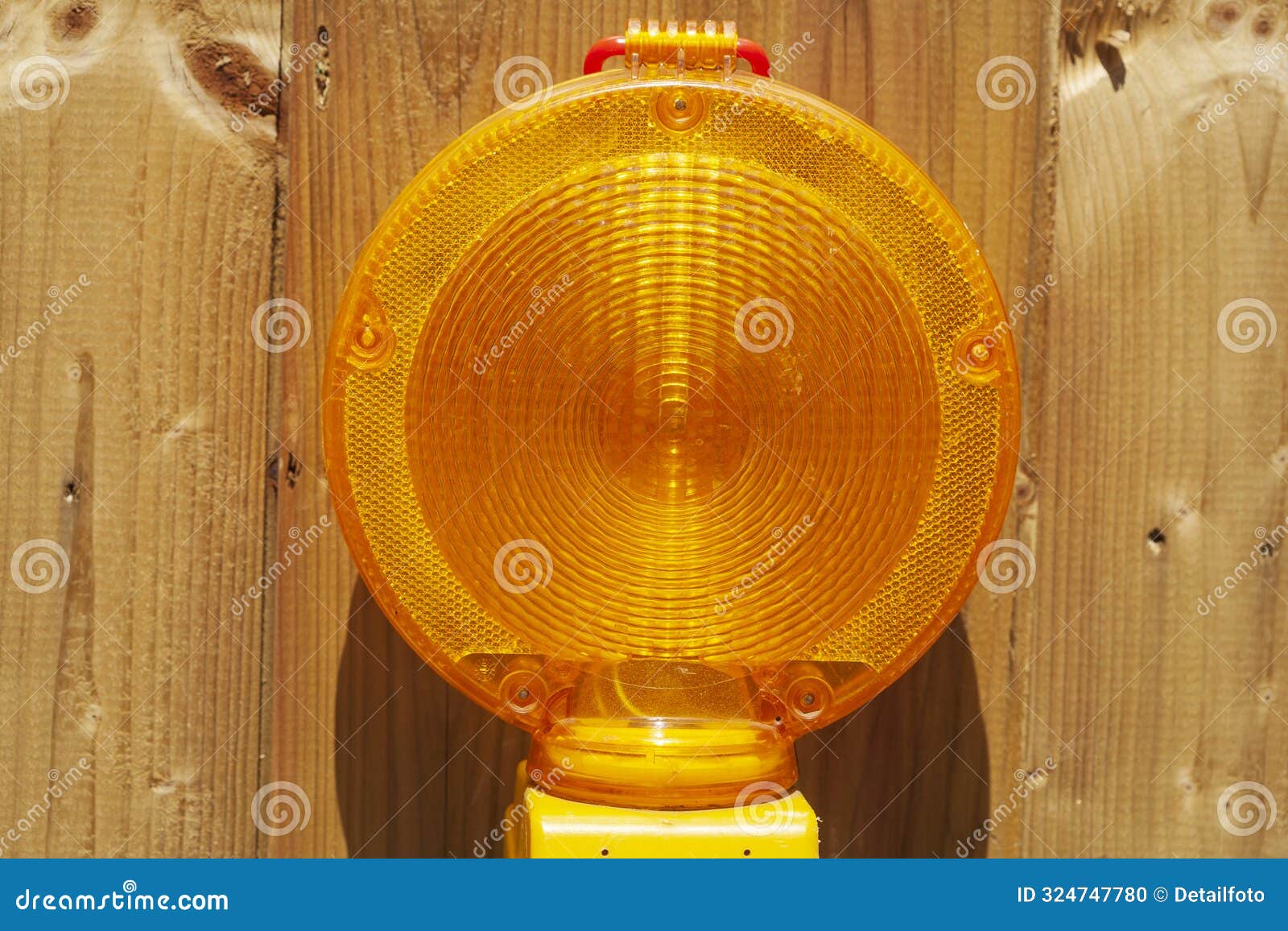 Orange Construction Site Lamp on a Site Fence Stock Photo - Image of ...