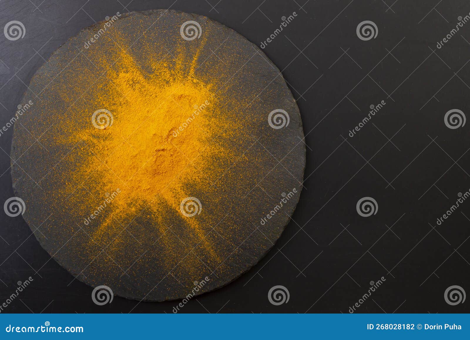 Orange Curry Powder Explosion on Black Stone Texture Stock Photo ...