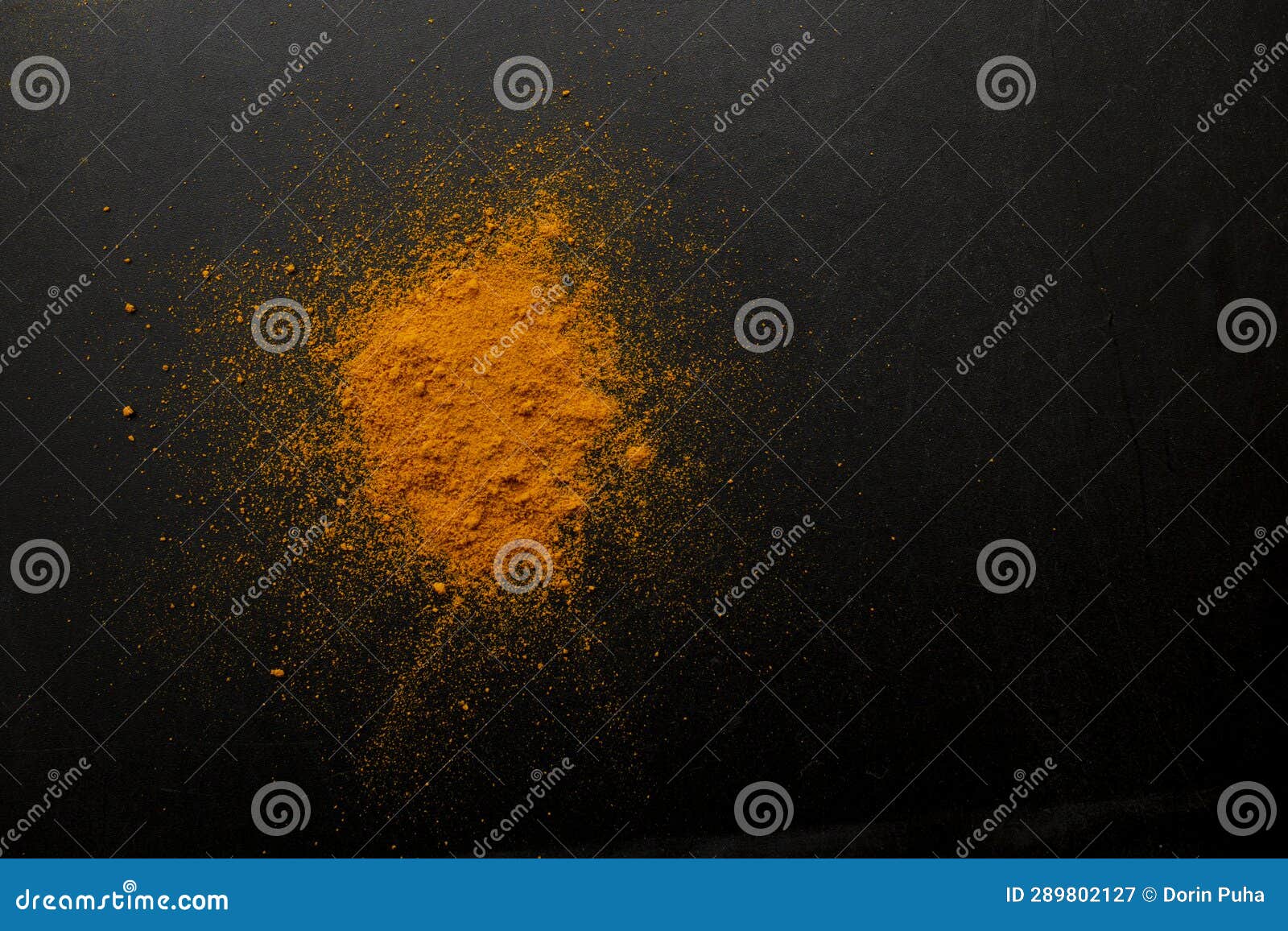 Orange Curry Powder Explosion on Black Texture, Soft Focus Stock Image ...