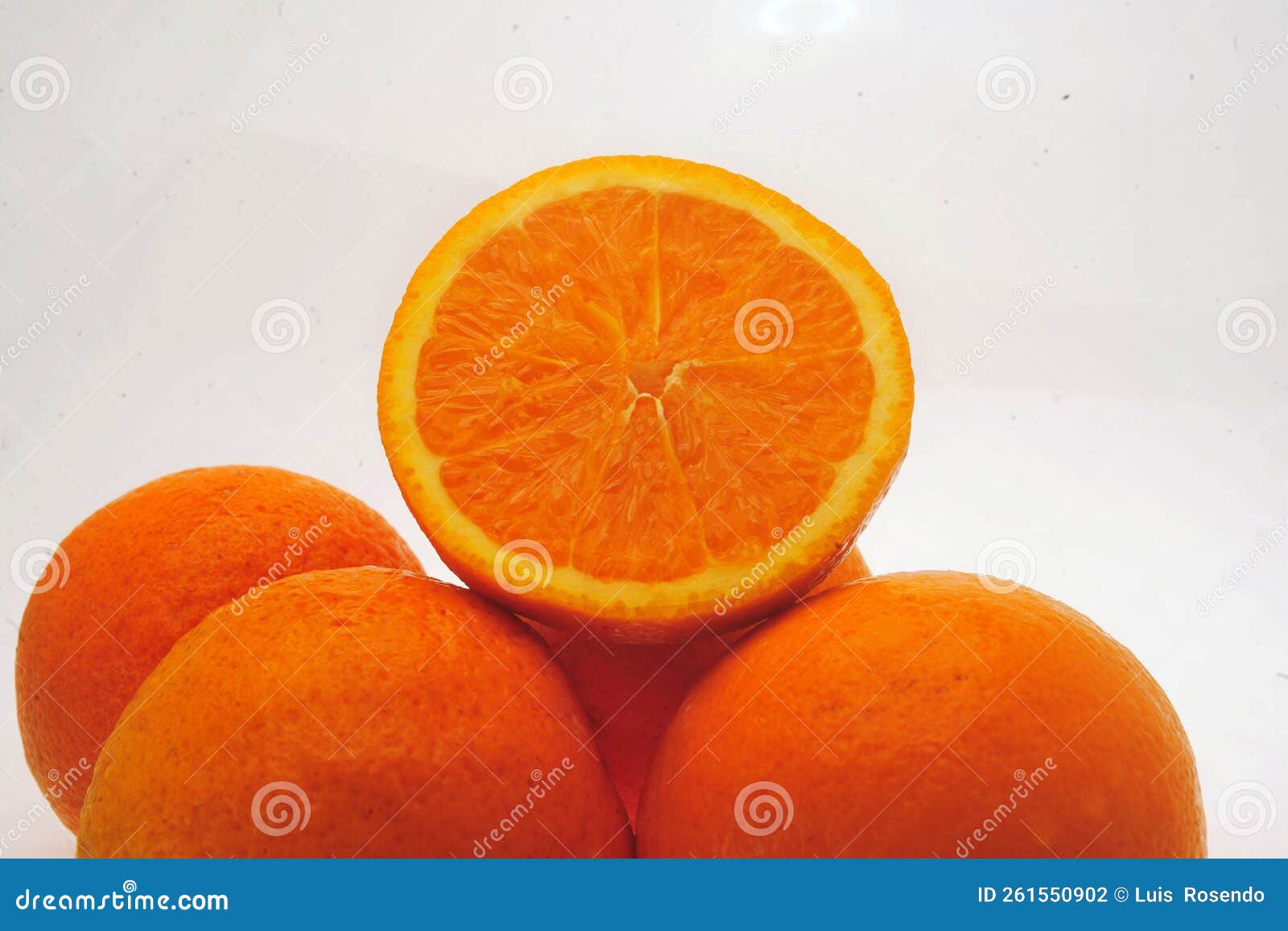 Orange with Cut in Half and Green Leaves Isolated on White Background ...