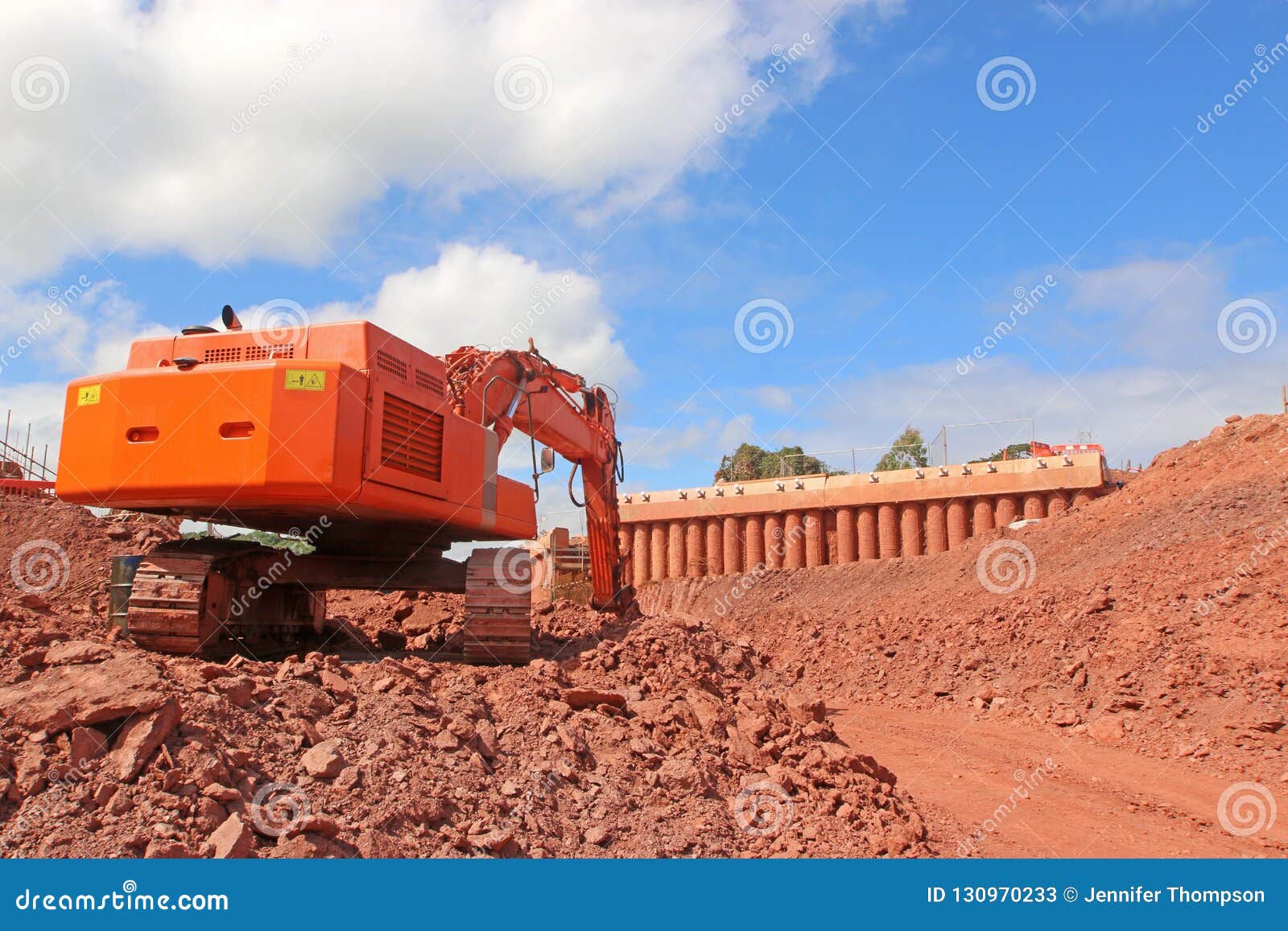 Digger on a Construction Site Stock Image - Image of stone, tracks ...