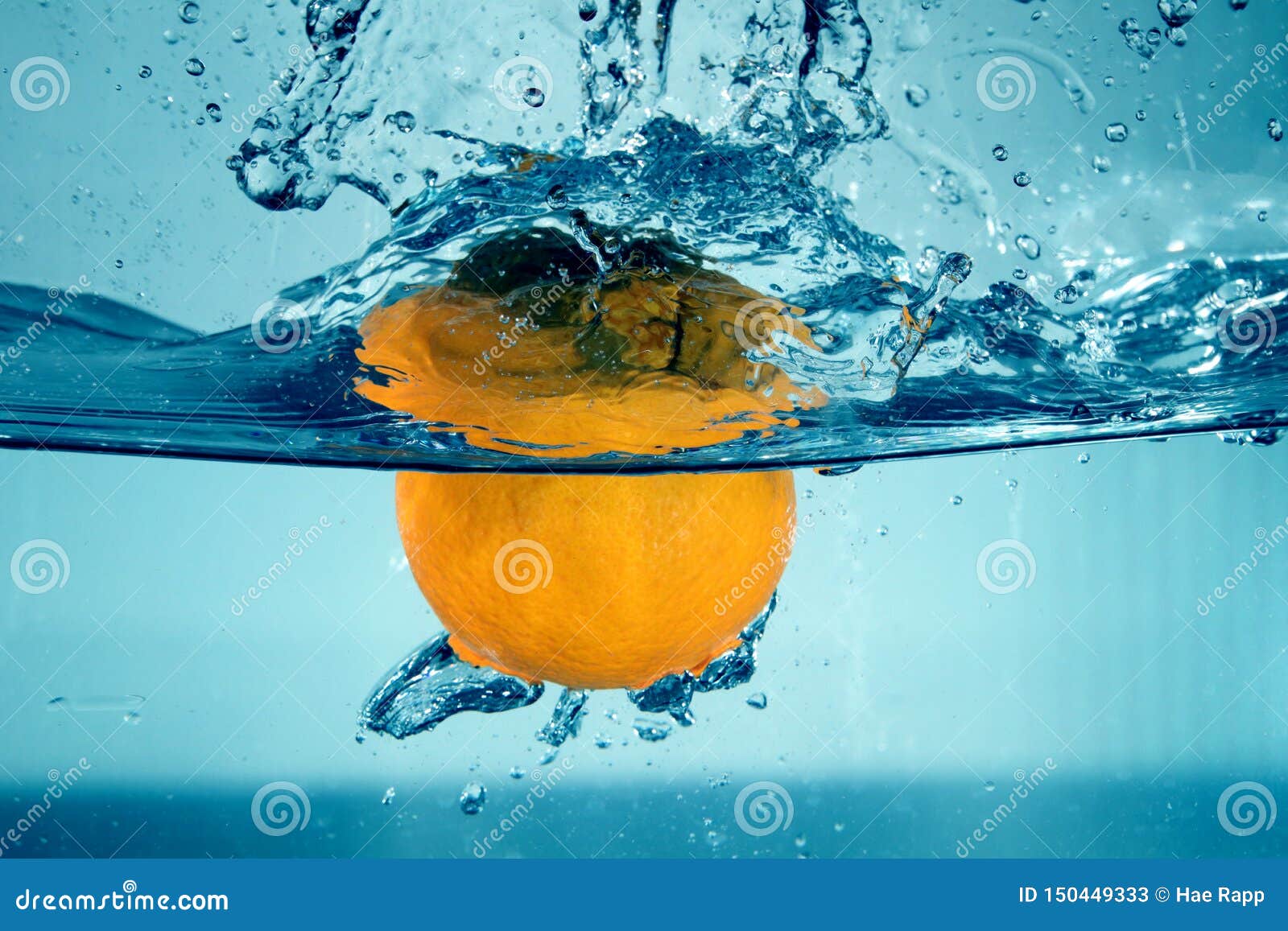 Orange Splashing into the Water Stock Image - Image of flowing, clear ...