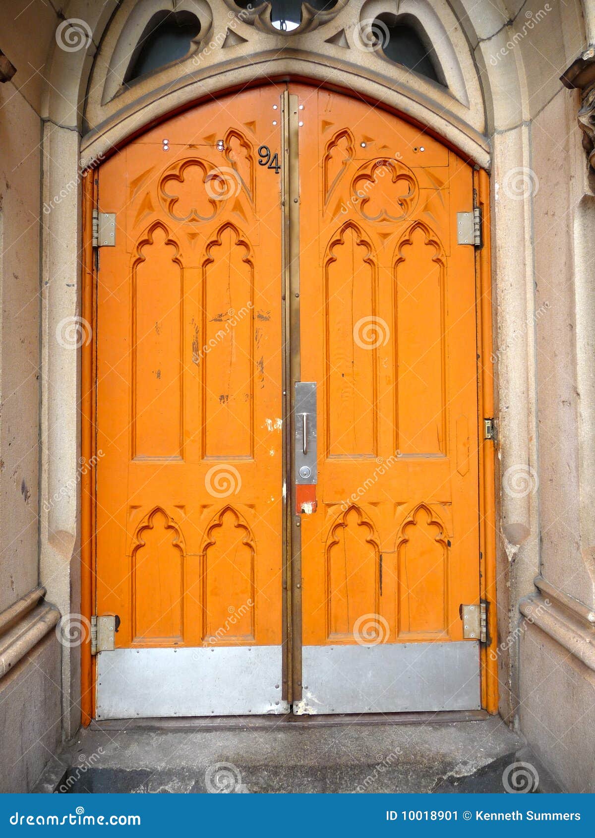 Orange doors stock image. Image of knob, handle, open - 10018901