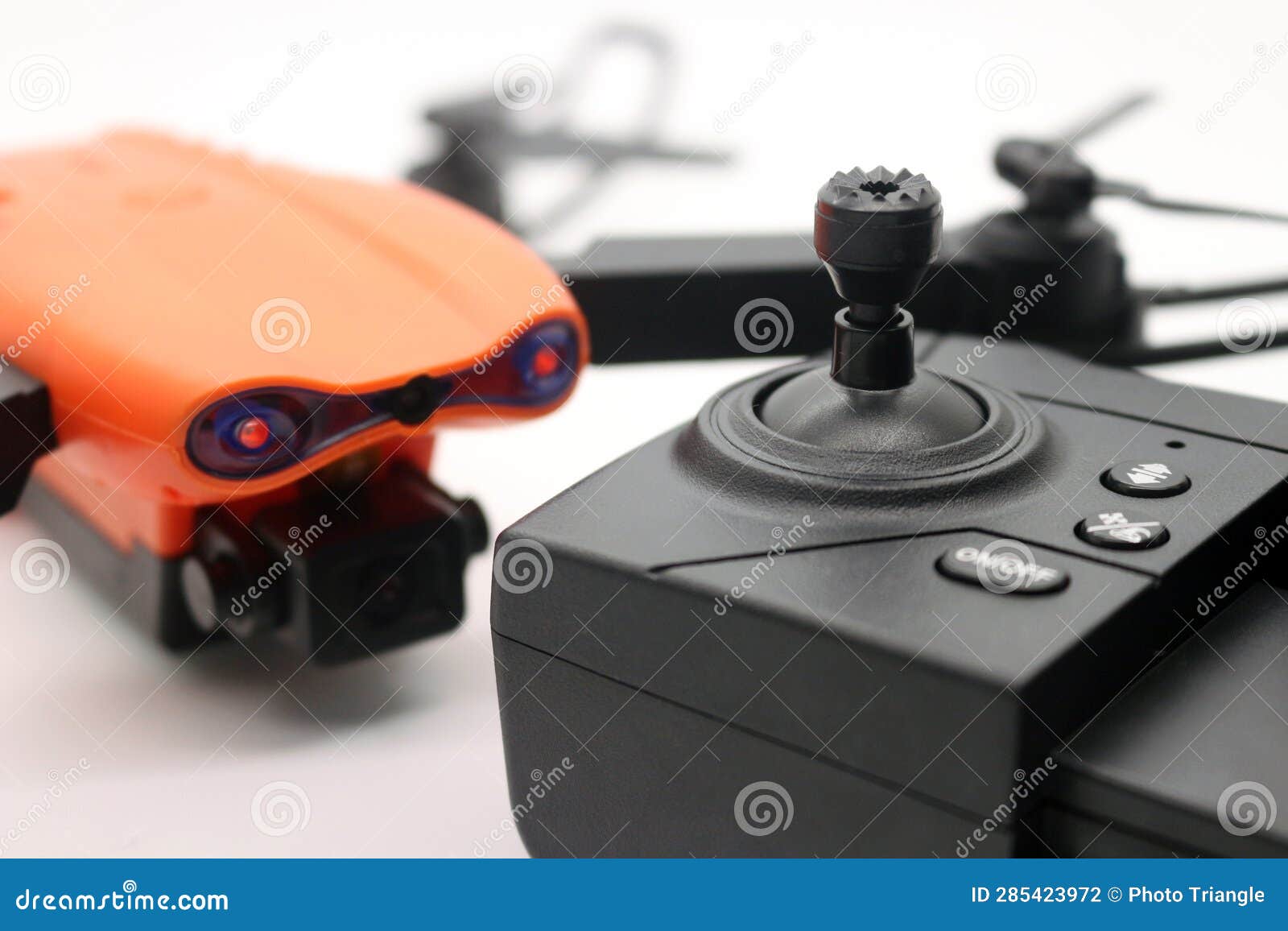 Orange Drone with Camera and Remote Control Stock Photo - Image of ...