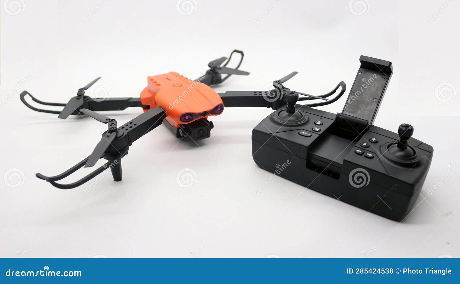 Orange Drone with Camera and Remote Control Stock Photo - Image of ...