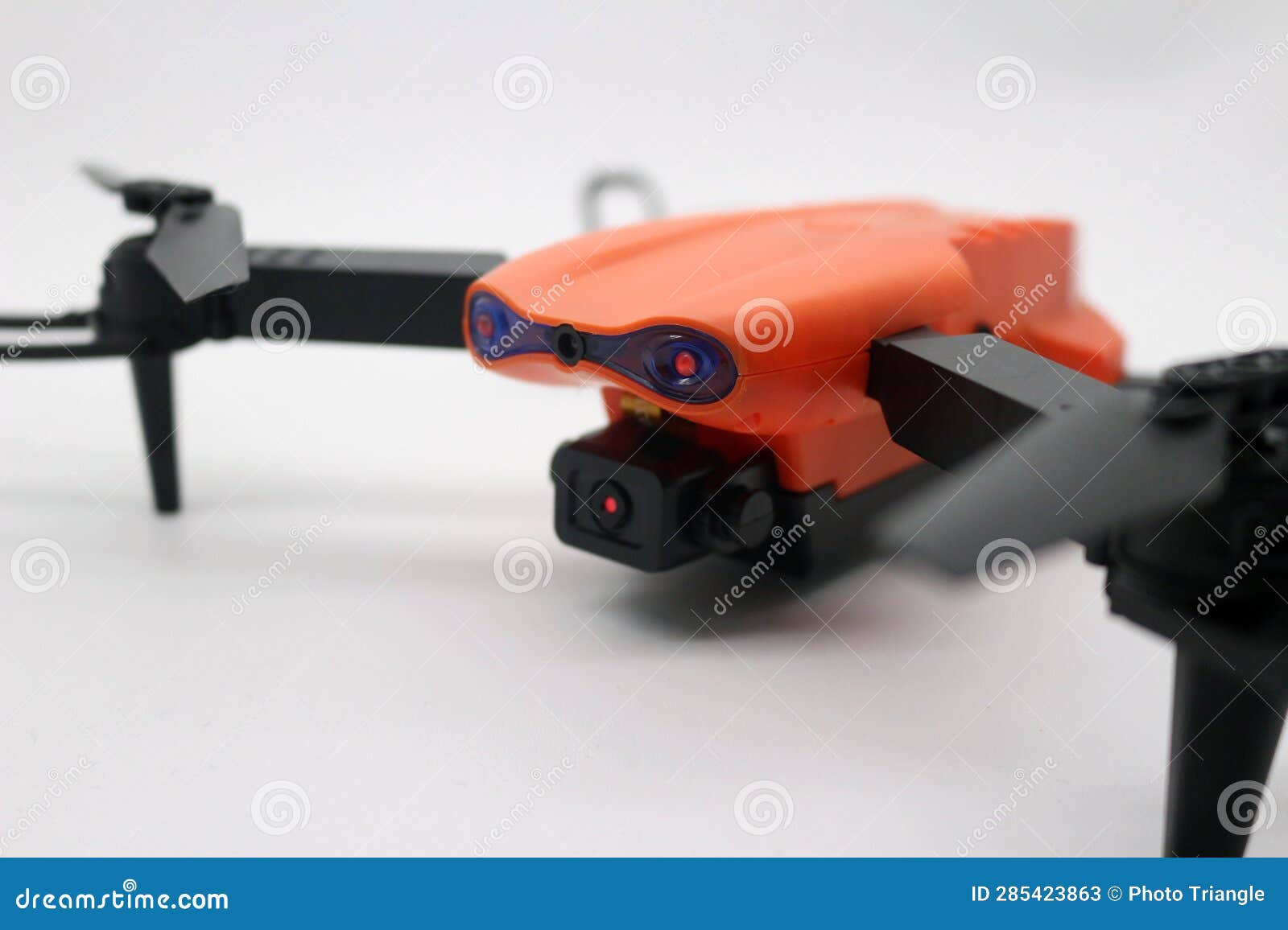 Orange drone with camera stock image. Image of recording - 285423863