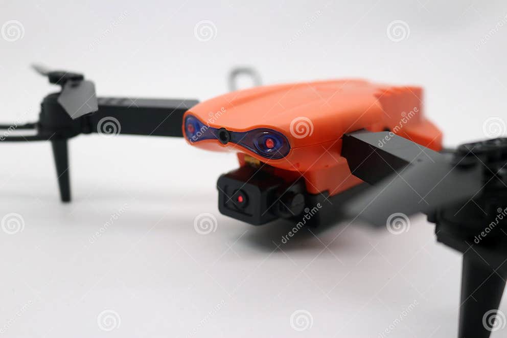 Orange drone with camera stock image. Image of recording - 285423863