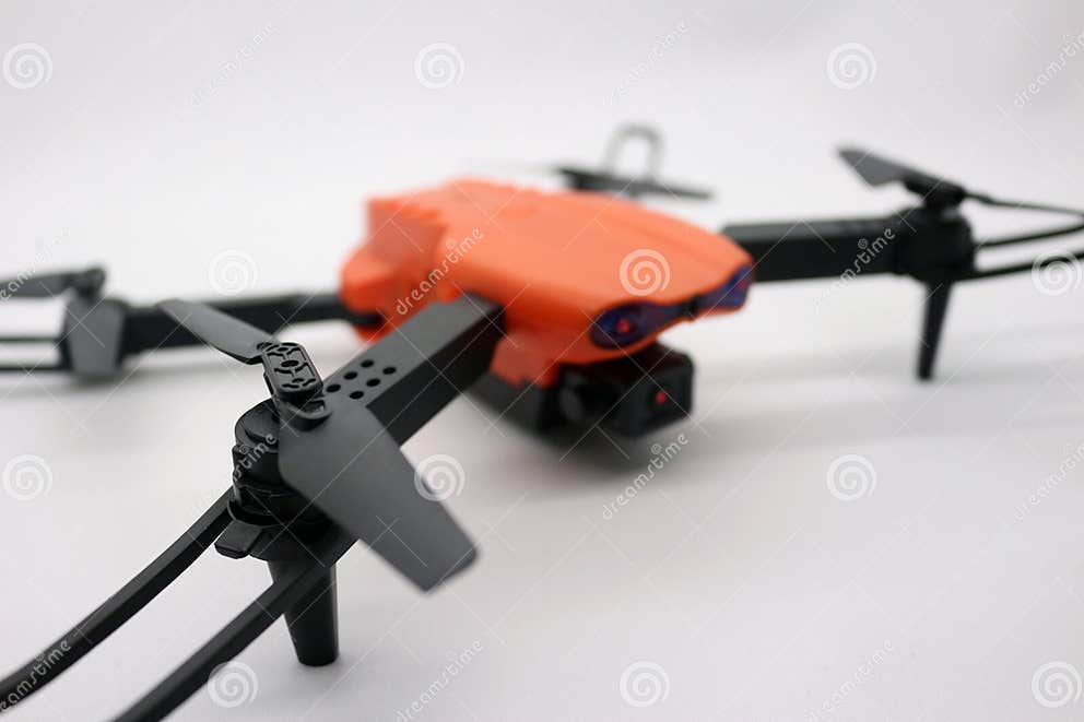 Orange drone with camera stock photo. Image of technique - 285423886