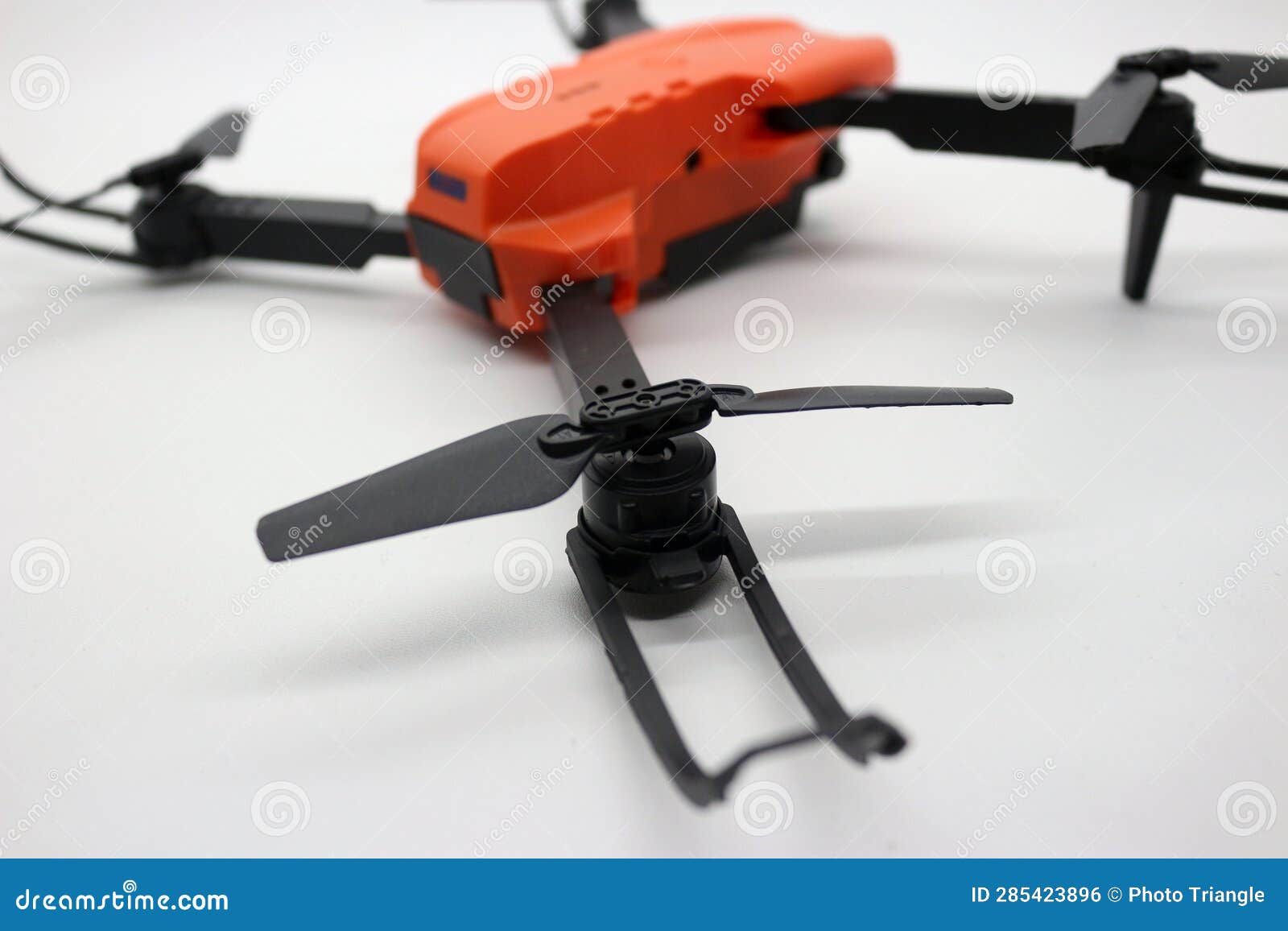 Orange drone with camera stock photo. Image of ground - 285423896