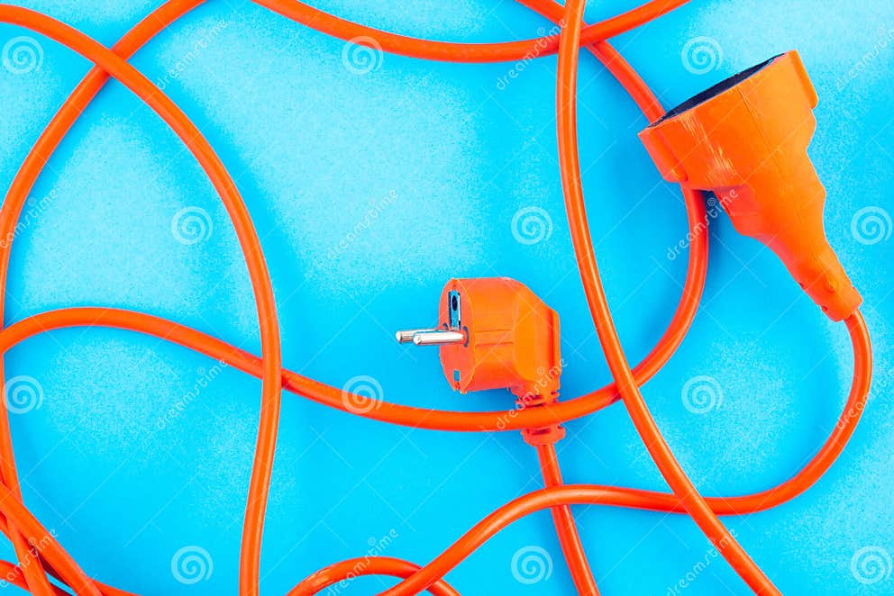 Orange Electrical Wire on Blue Background. Stock Photo - Image of ...