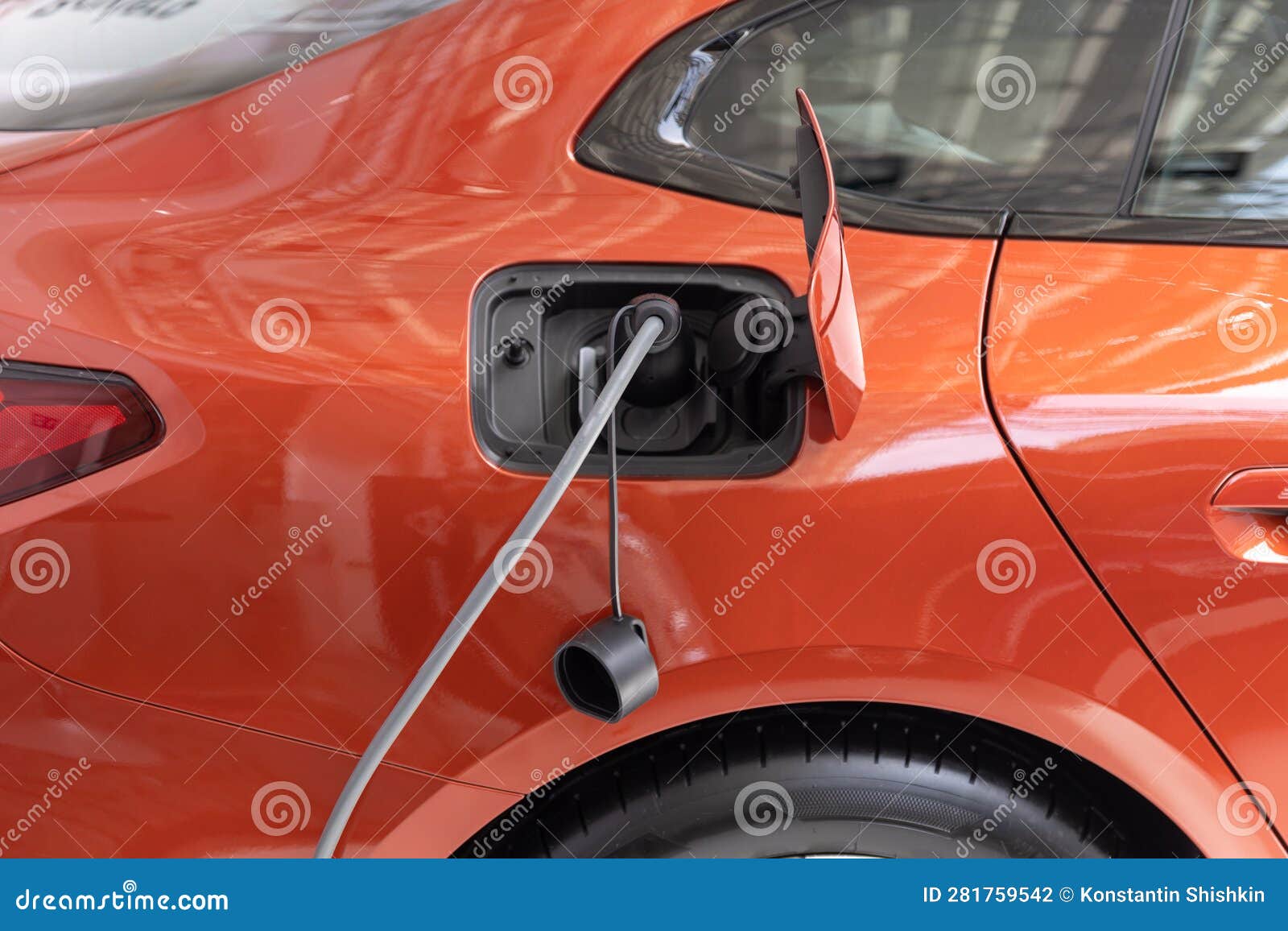 Orange Electro Car on Charging at the Station Stock Photo - Image of ...
