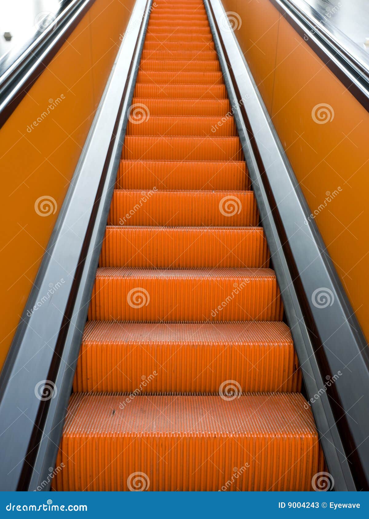 Orange escalator stock image. Image of direction, steel - 9004243