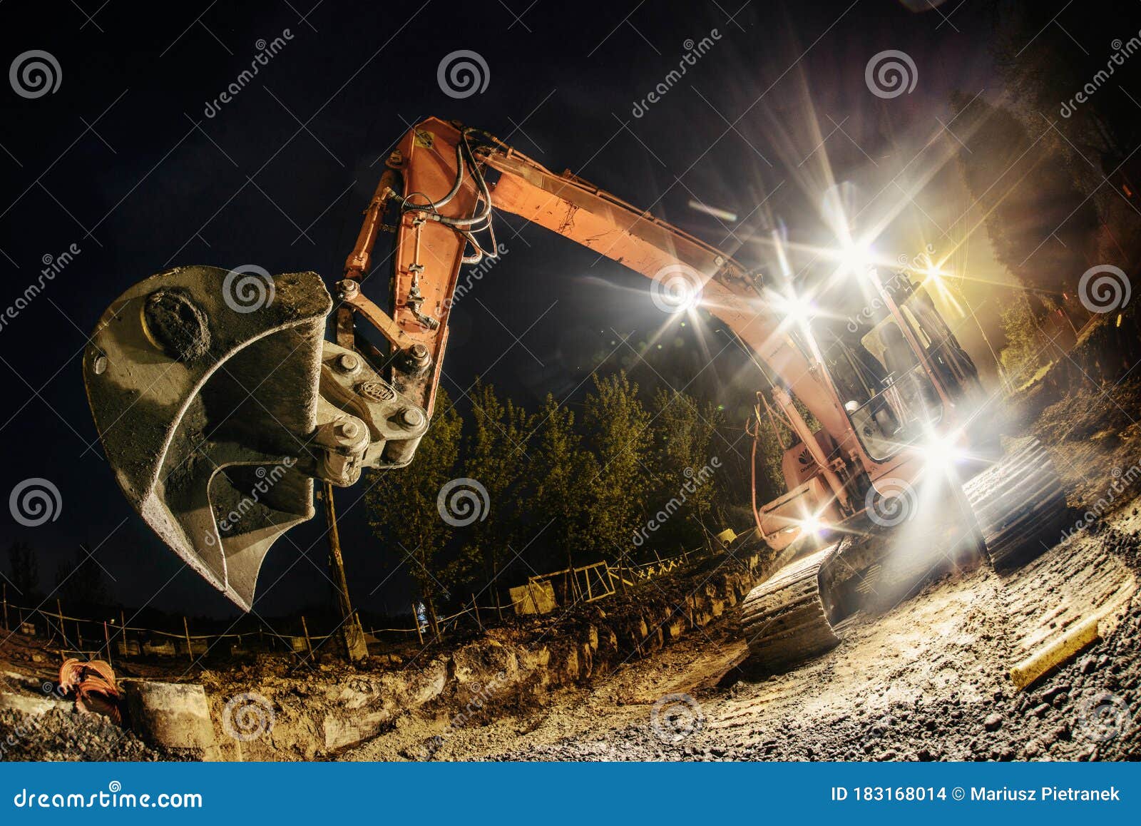 Orange Excavator Digger Working at Night on the Street Stock Photo ...
