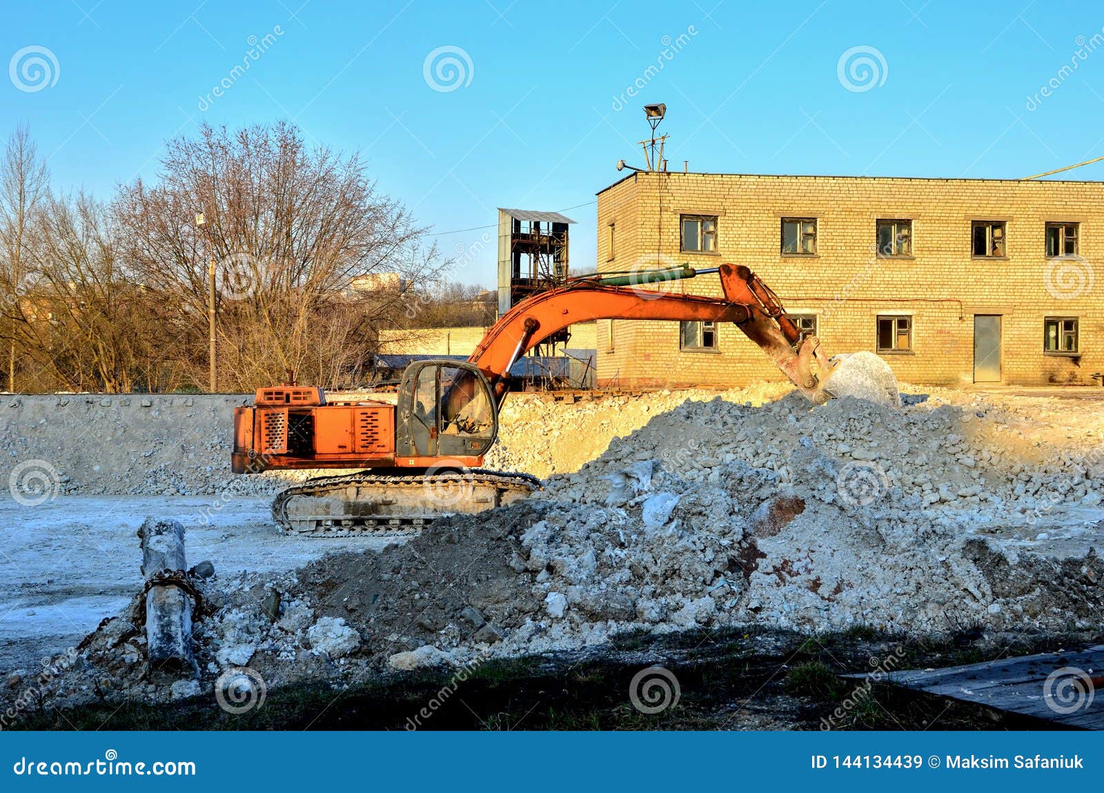 Excavator Working on an Industrial Building Site Stock Image - Image of ...