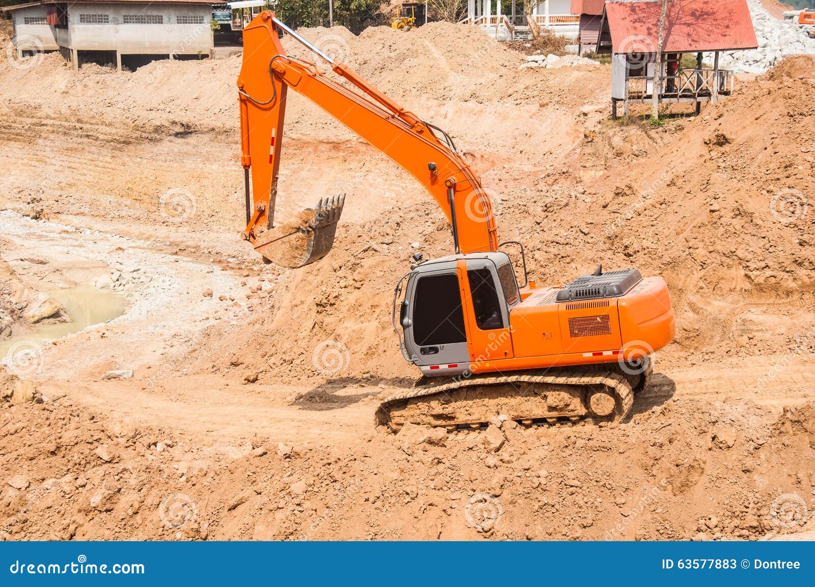 Orange excavator stock image. Image of mover, earthmover - 63577883
