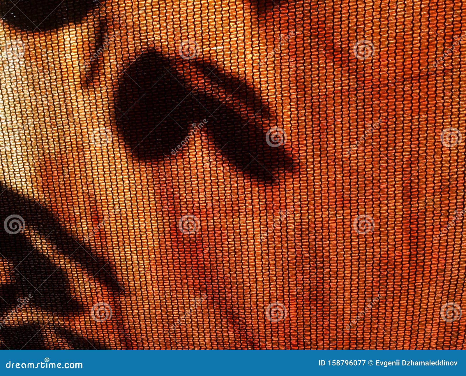 Orange Fabric on a Background of the Sun. the Texture of the Fabric ...