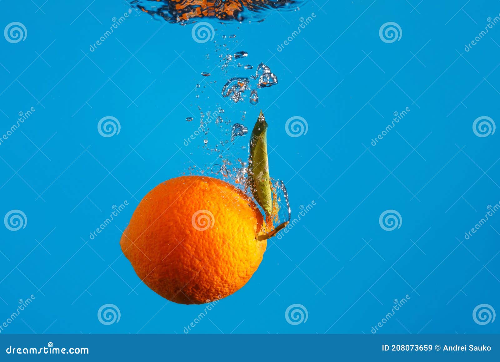 Orange Falls into the Water with a Splash Stock Image - Image of sign ...