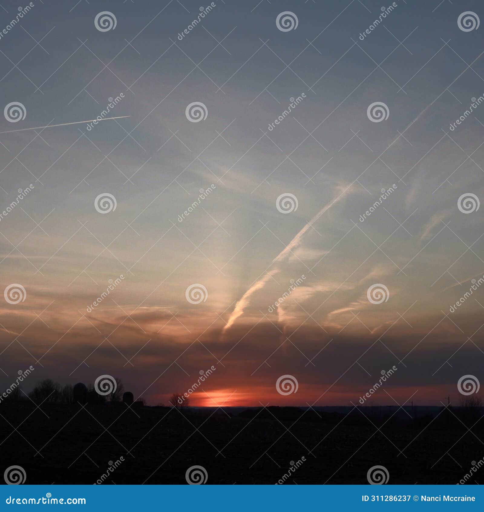 Orange FingerLakes Sunset Clouds with Sun Pillar and Shadow Stock Image ...