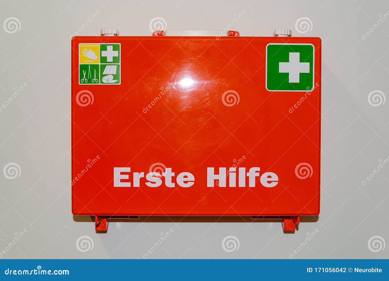 Orange First Aid Case Labeled in German Language “First Help” Hanging ...
