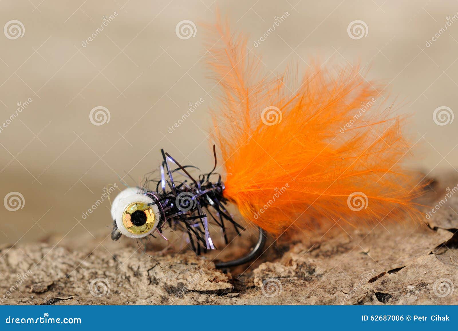 Orange fishing fly stock photo. Image of sport, artificial - 62687006