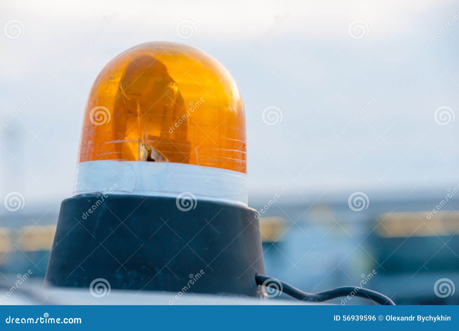 Orange Flashing and Revolving Light on Top of a Stock Photo - Image of ...