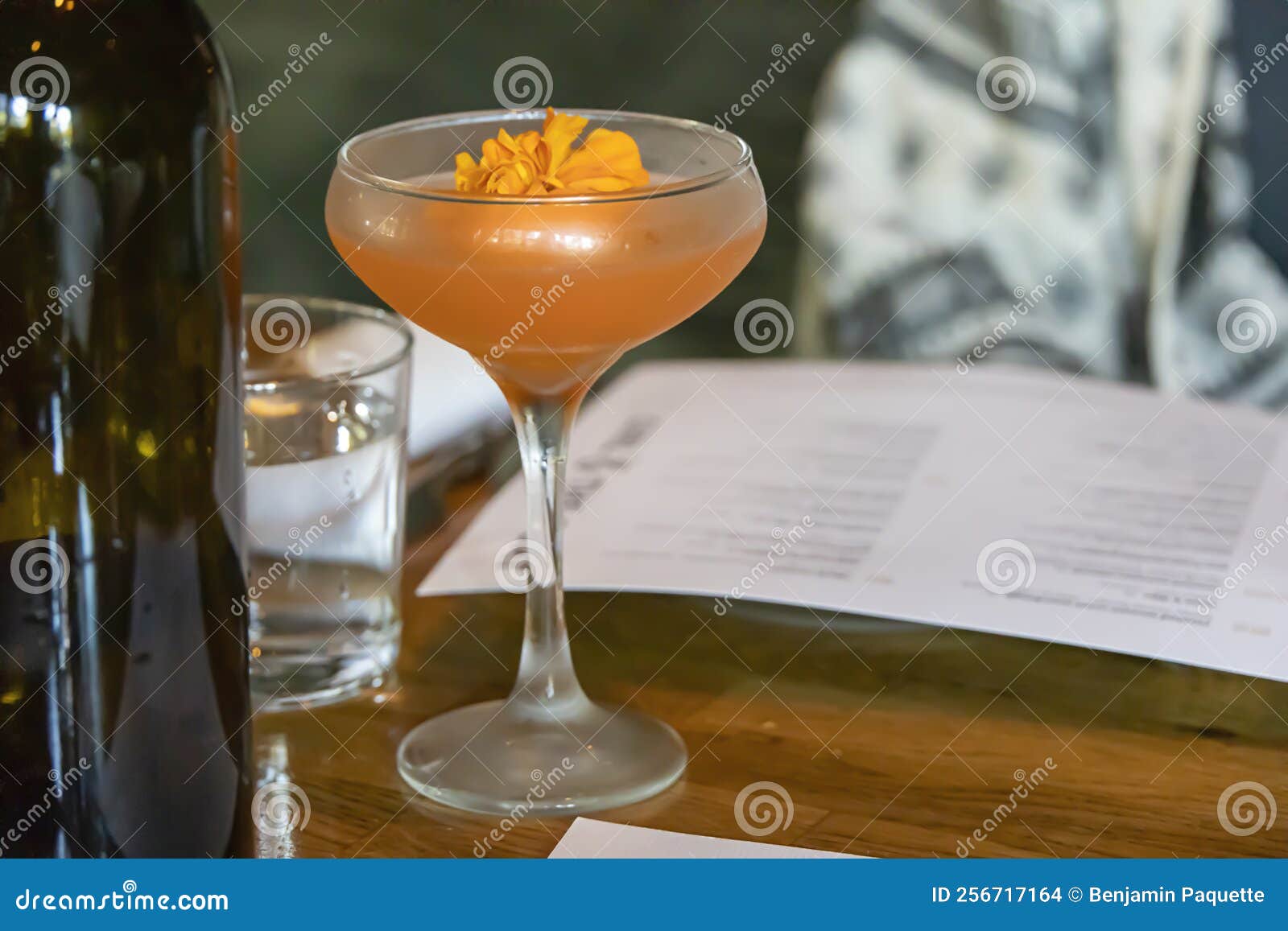 Orange Flavored Drink with a Flower at a Bar Stock Photo - Image of ...