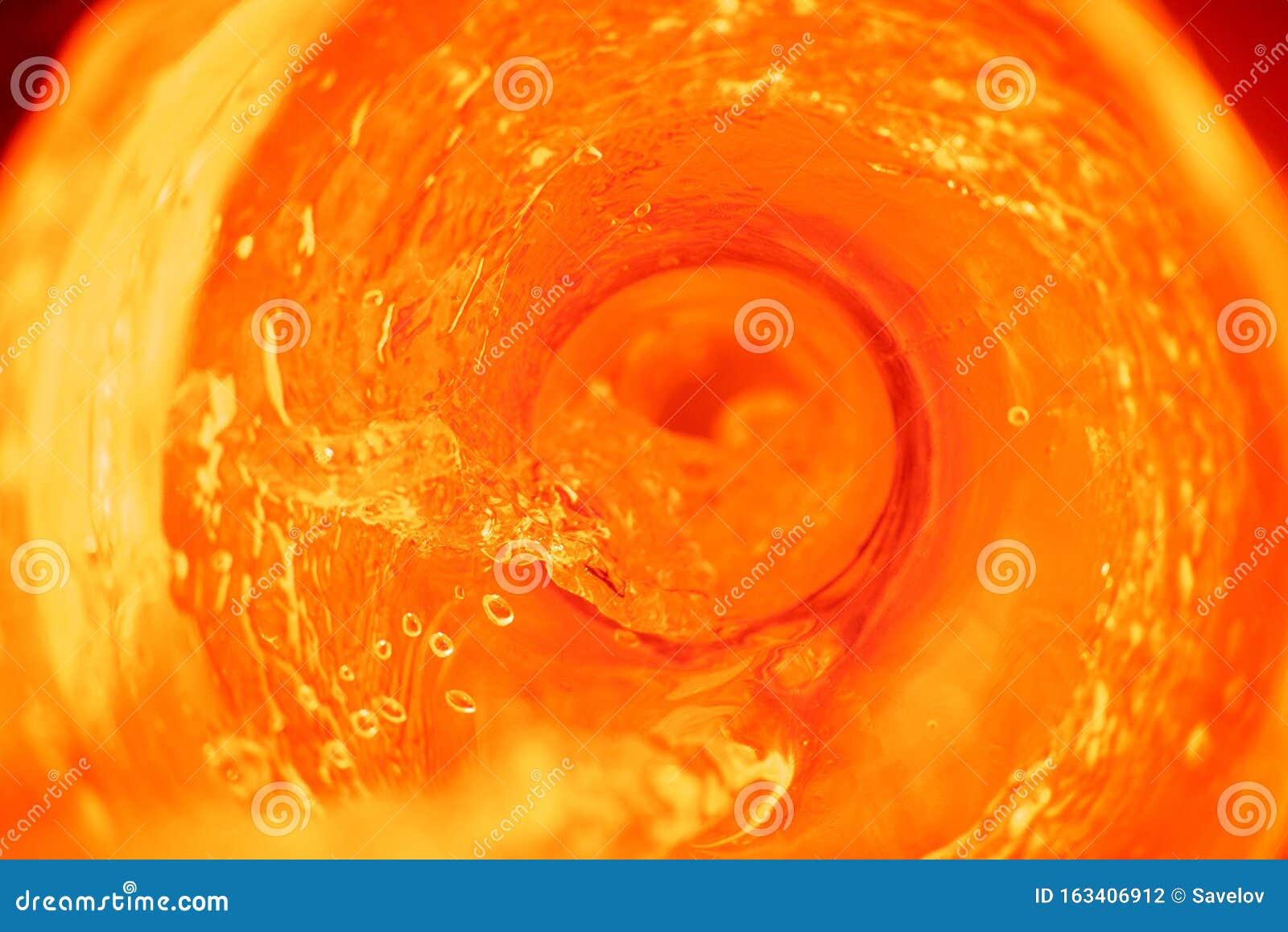 Orange Fluid Flowing with Splashes on Top Stock Photo - Image of bubble ...