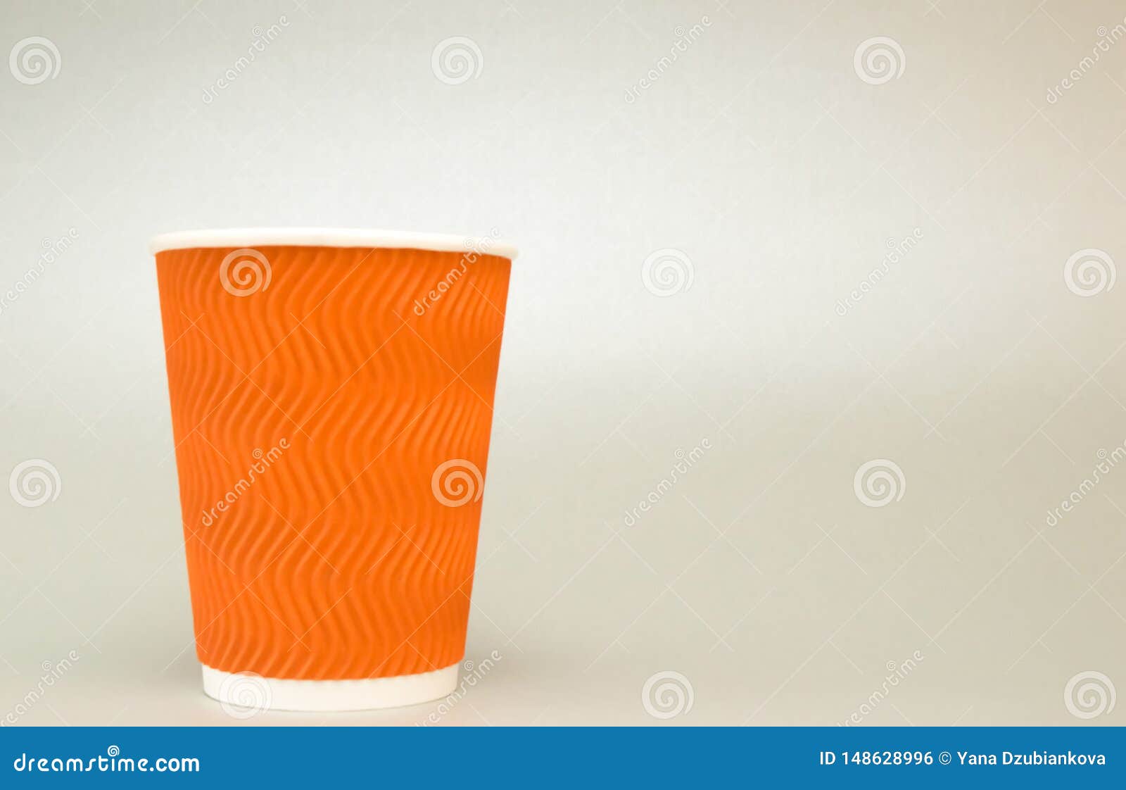 Orange Fluted Paper Cup for Coffee Stands on White Background Stock ...