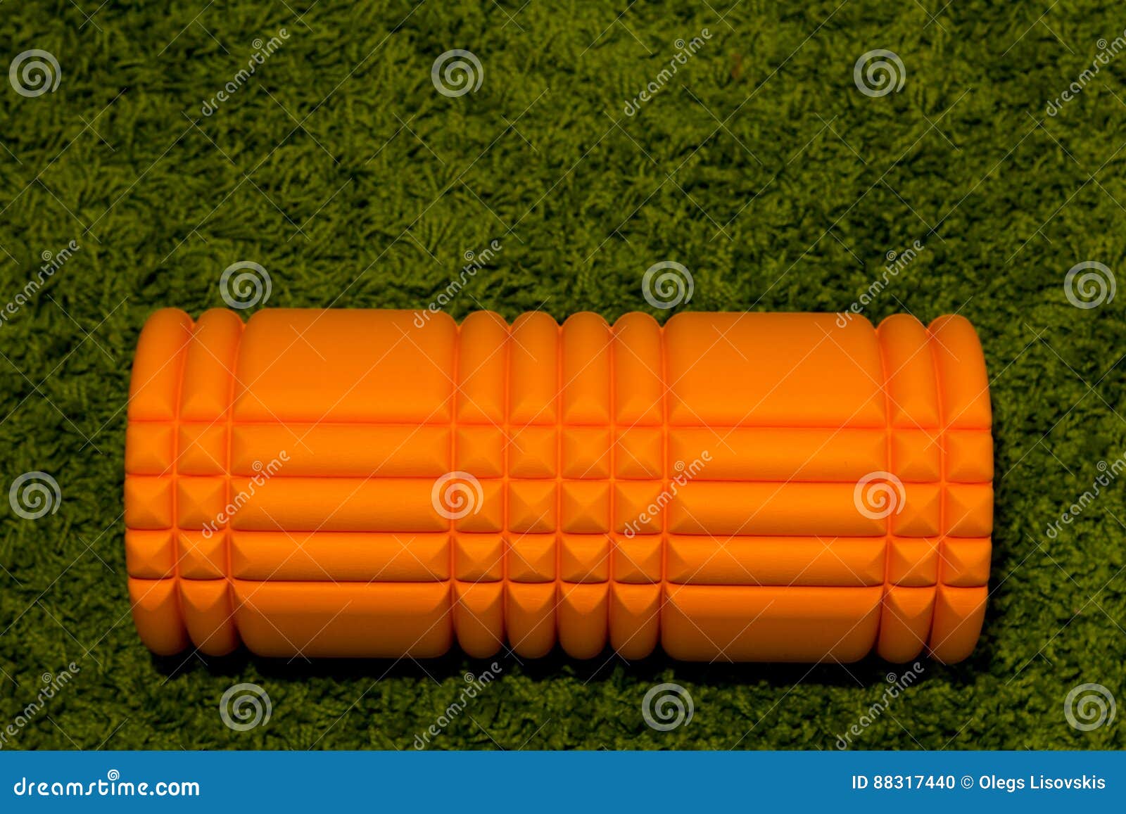 Orange Foam Roller on Green Background Stock Photo - Image of foam ...