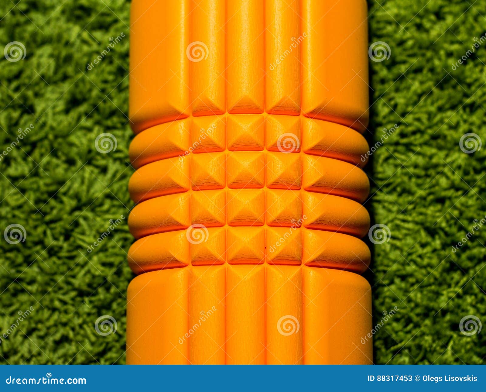 Orange Foam Roller on Green Background Stock Image - Image of exercise ...