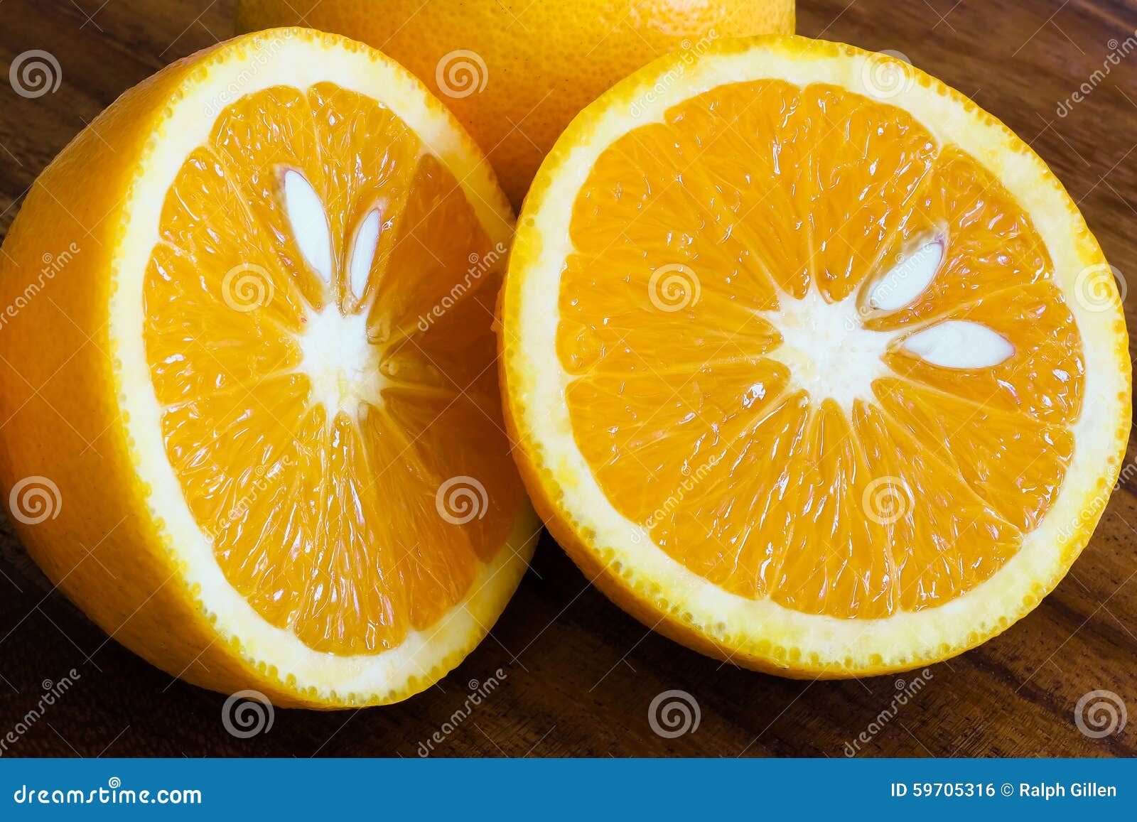 Orange Fruit cut in Half stock photo. Image of zest, tasty - 59705316