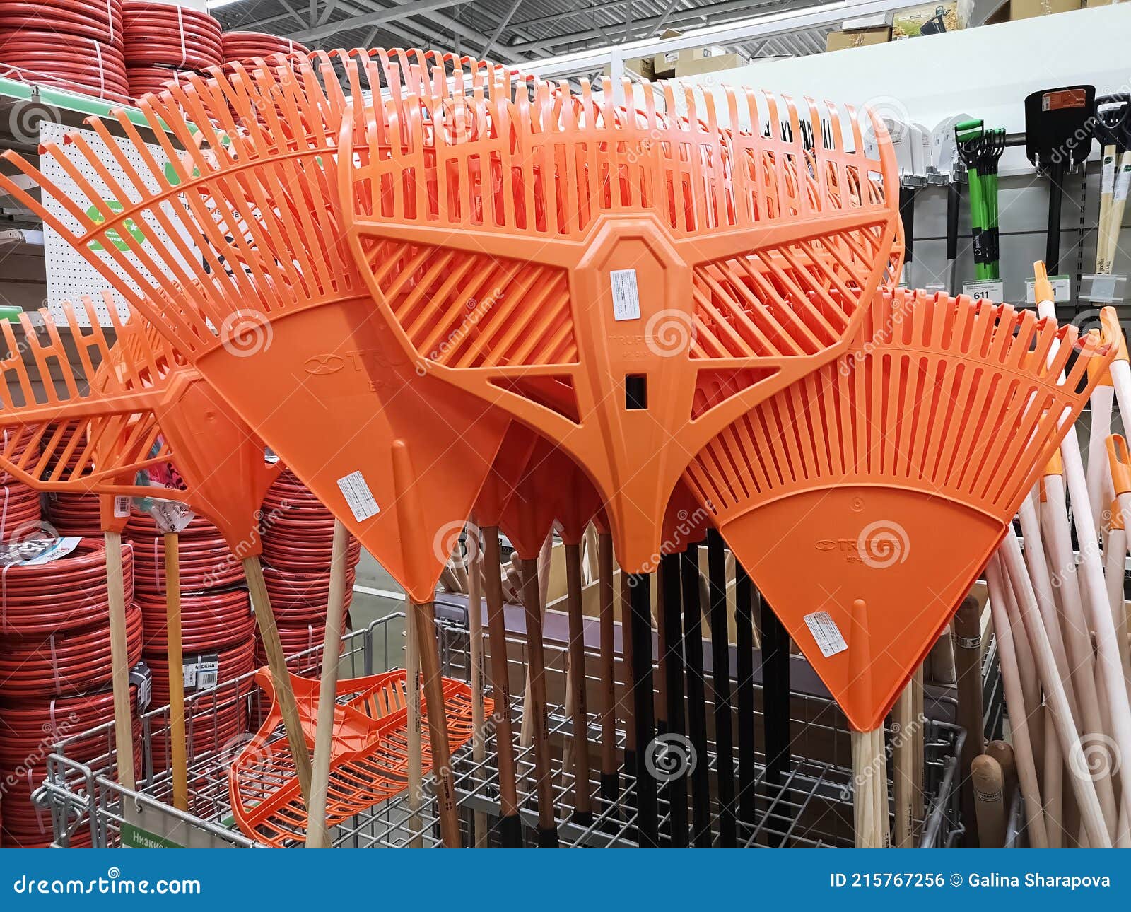 Orange Garden Rake Stands in a Box in a Large Building Store Stock ...