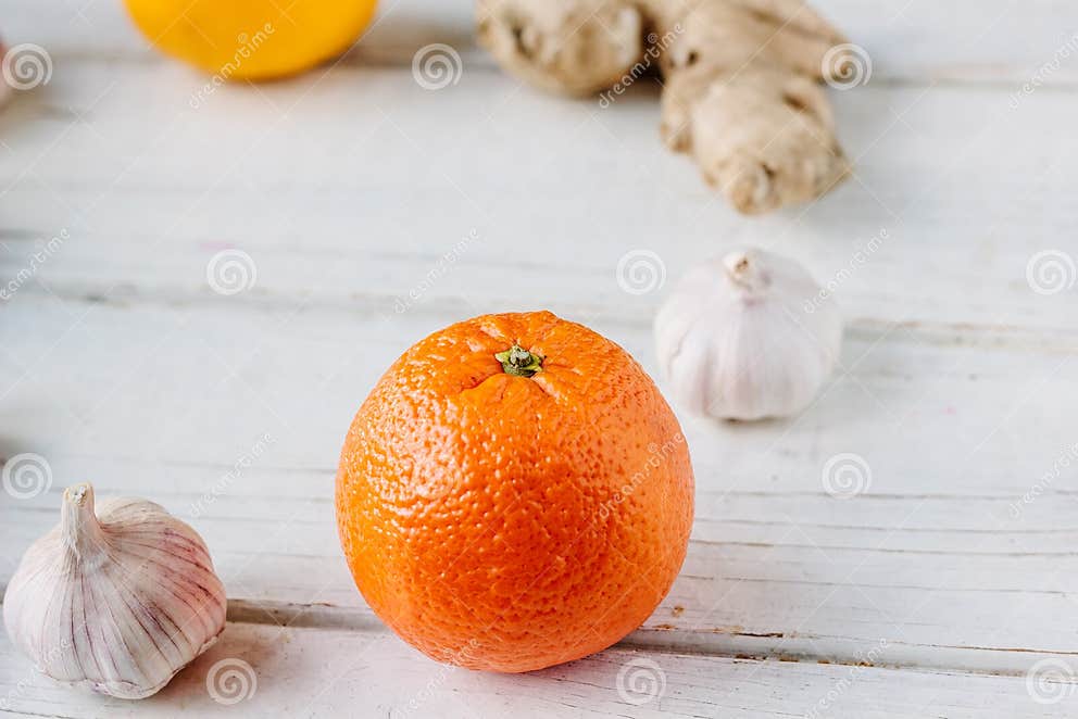Orange with Garlic and Ginger Stock Image - Image of lemon, wooden ...