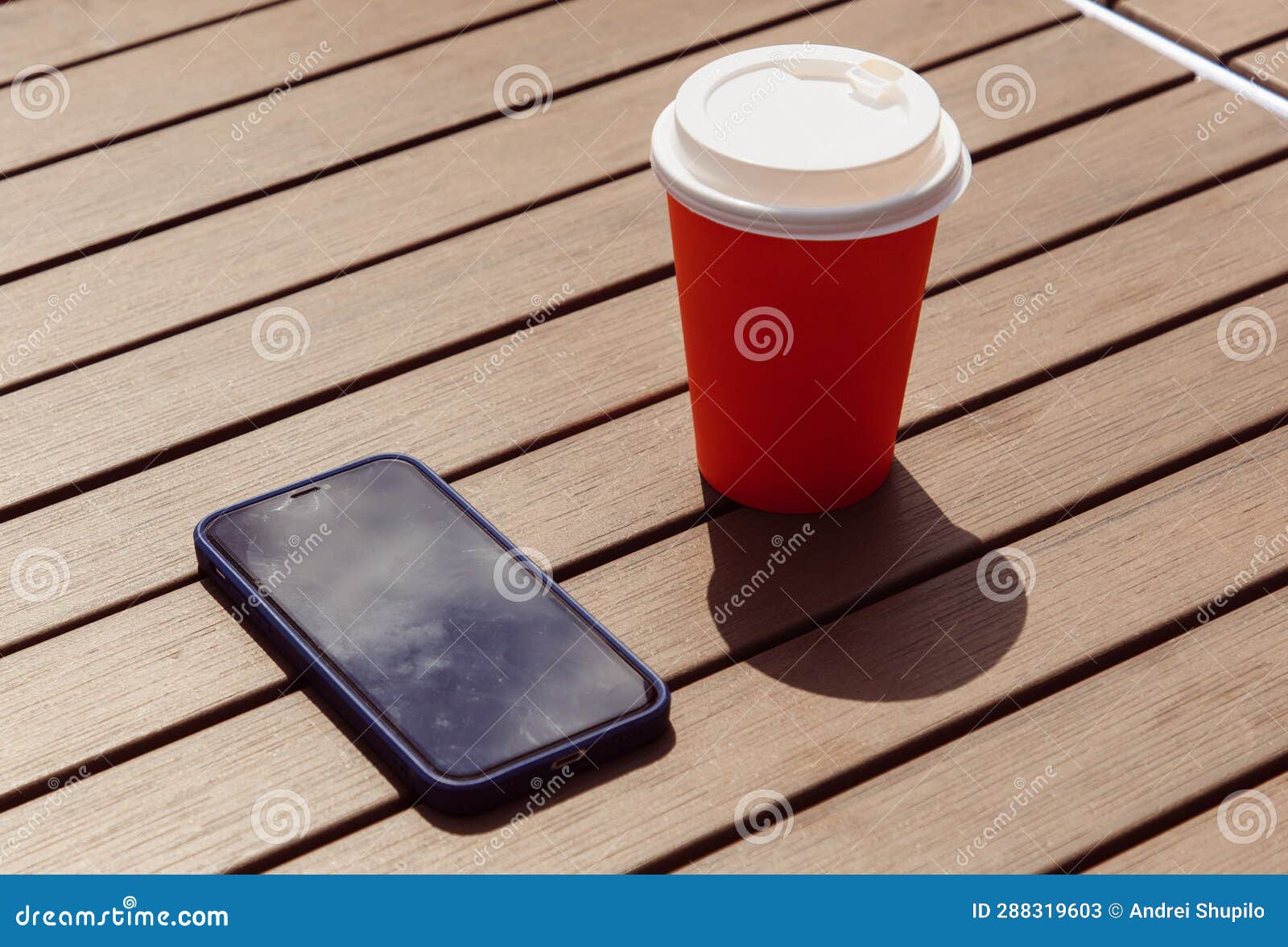 Orange Glass and Telephone on a Wooden Table. Stock Image - Image of ...
