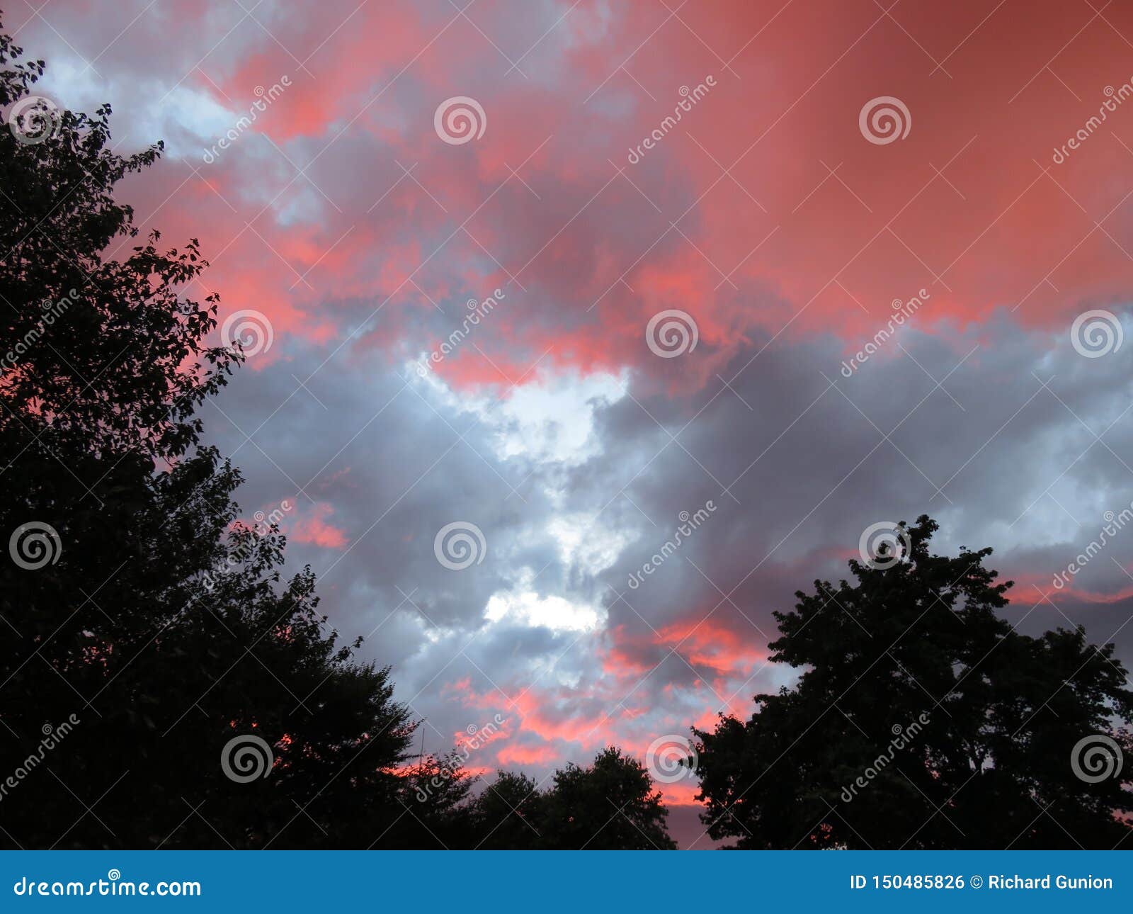 Orange and Gray Sunset Clouds Stock Photo - Image of clouds, leaves ...