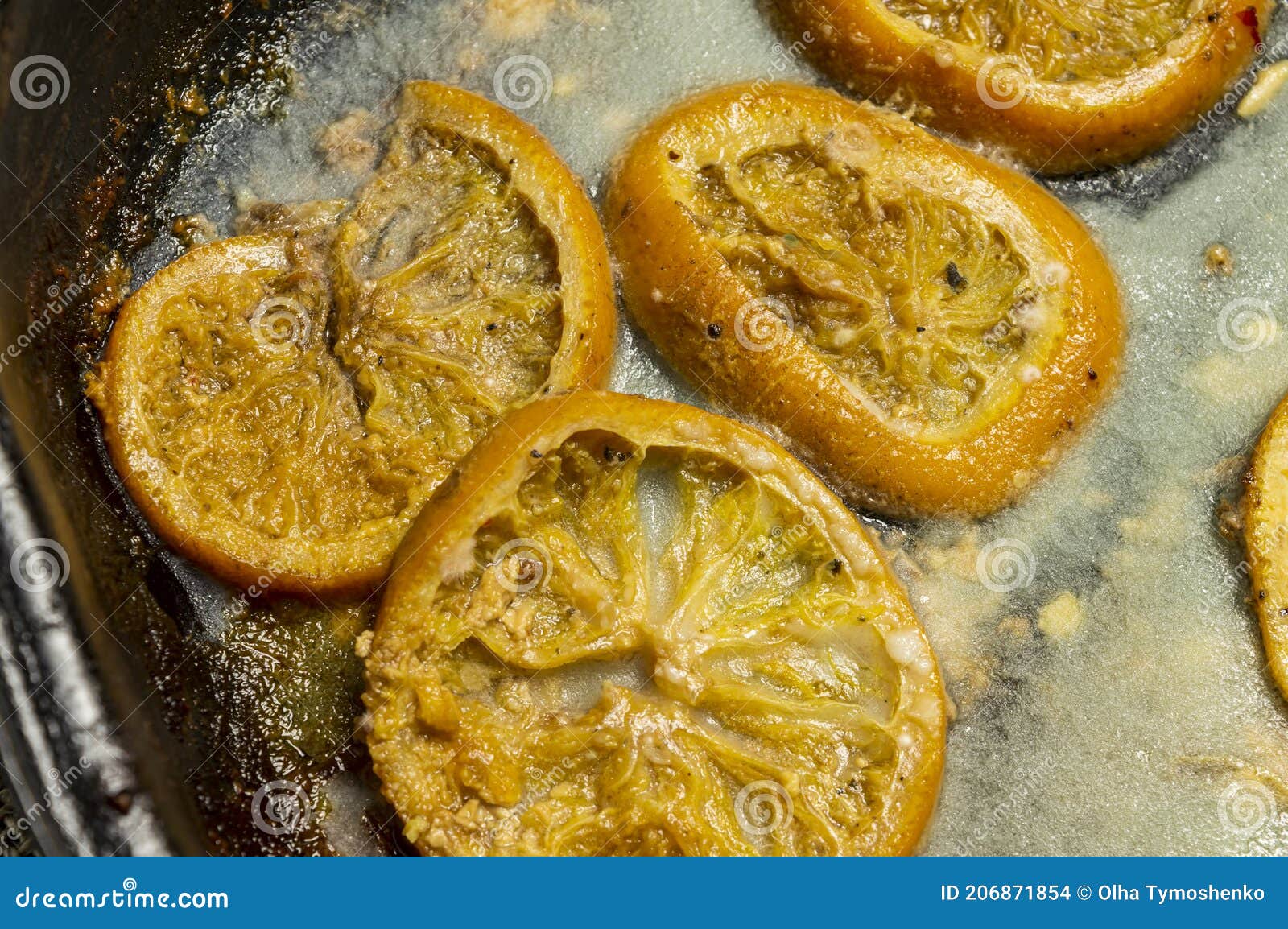 Orange in Greasy after Frying in a Frying Pan Stock Photo - Image of ...