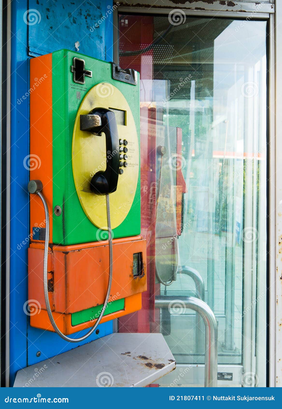 Orange Green and Yellow Public Phone Stock Image - Image of booth ...