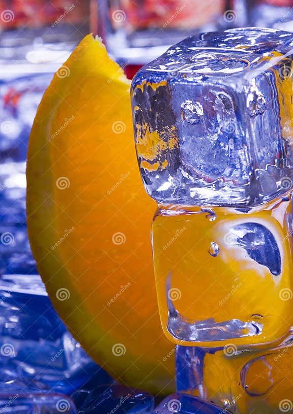 Orange with ice cubes stock image. Image of ingredients - 2169517