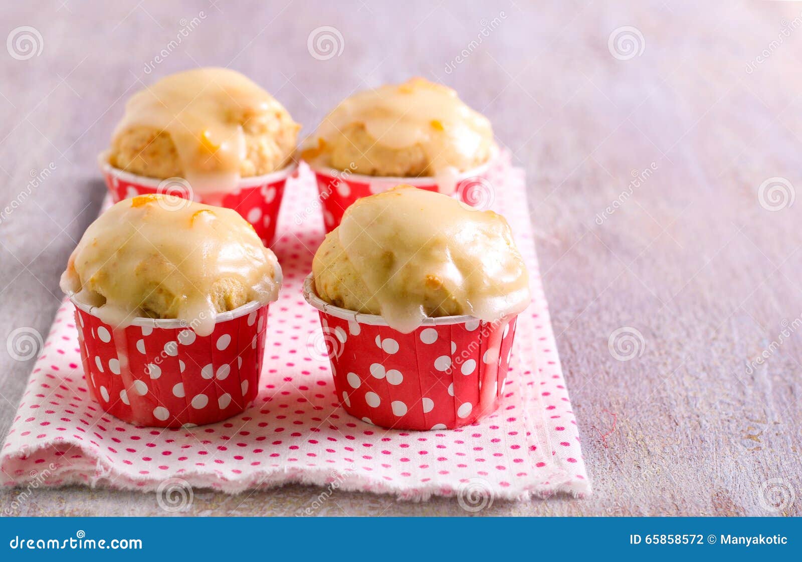 Orange Icing Mini Cakes on Table Stock Photo - Image of cakes, muffins ...