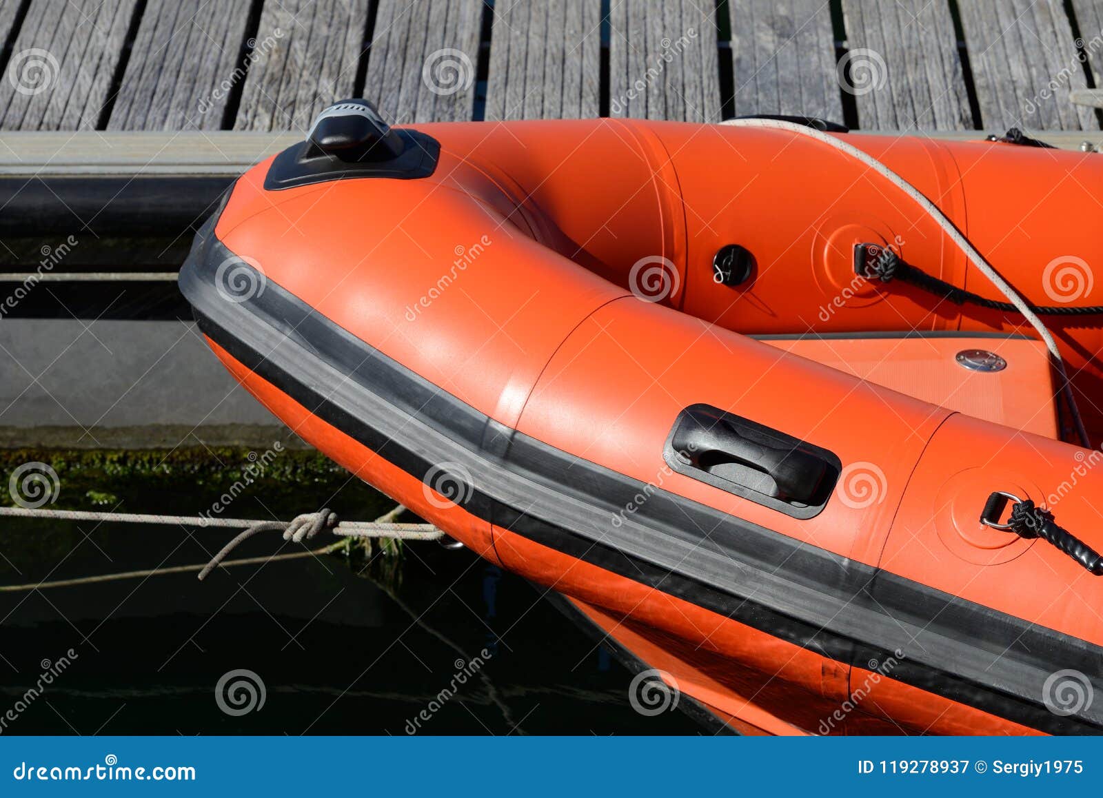 Orange Inflatable Boat Moored Near the Pier Stock Image - Image of ...