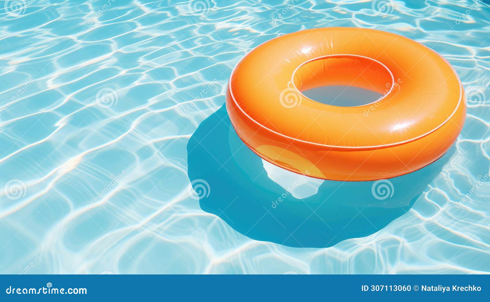 An Orange Inflatable Circle on the Surface of the Pool Stock Photo ...