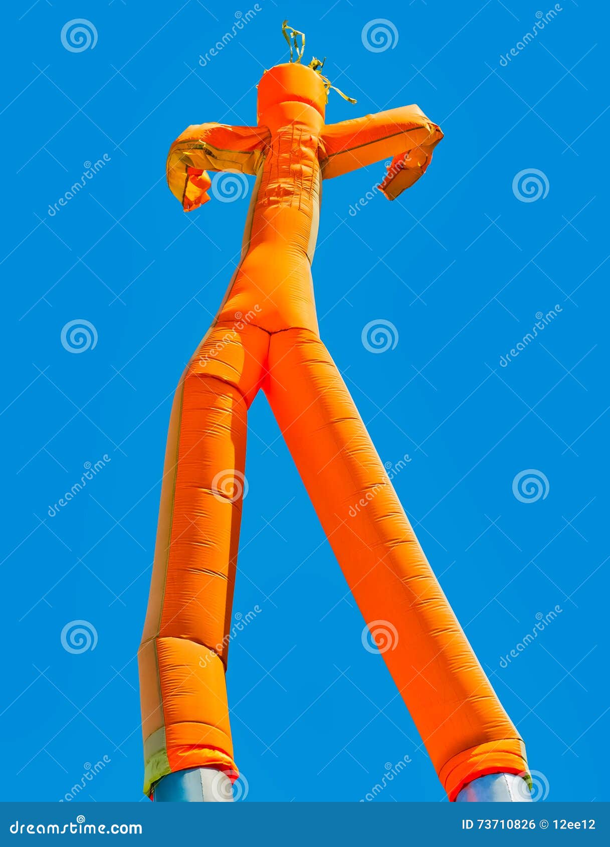 Orange inflatable man stock photo. Image of body, attraction - 73710826