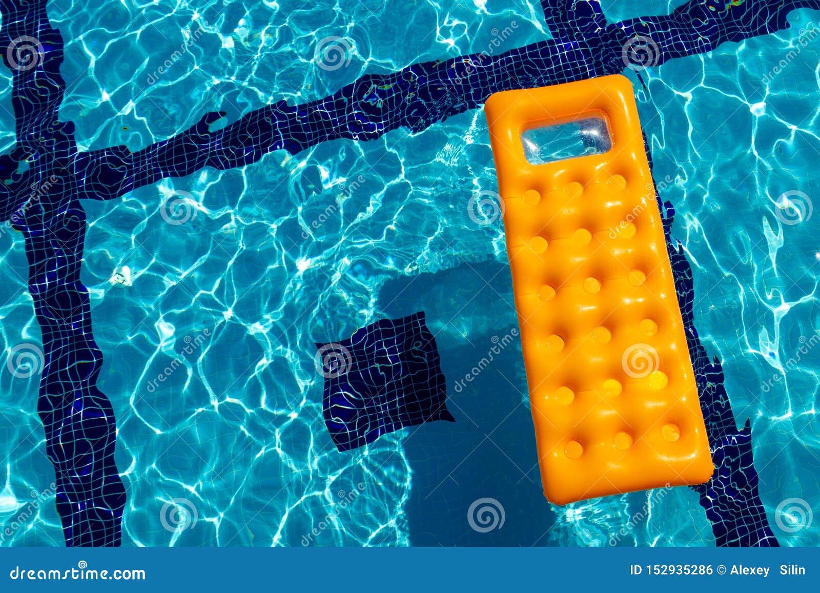 Orange Inflatable Mattress in the Pool. Stock Photo - Image of object ...